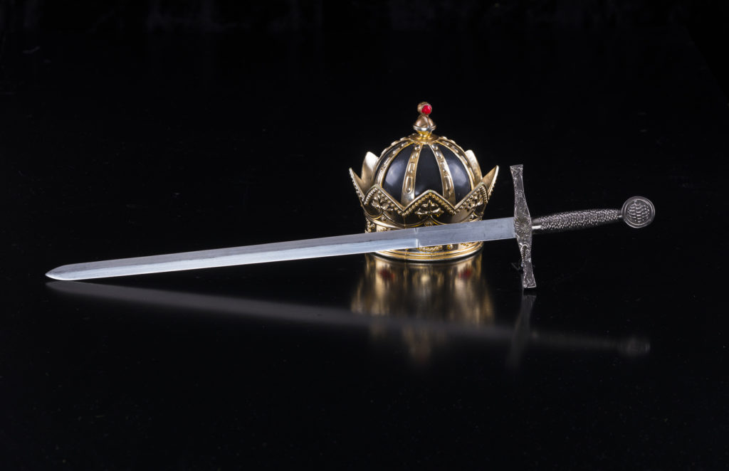 Medieval sword and crown on a black isolated background - Center for ...